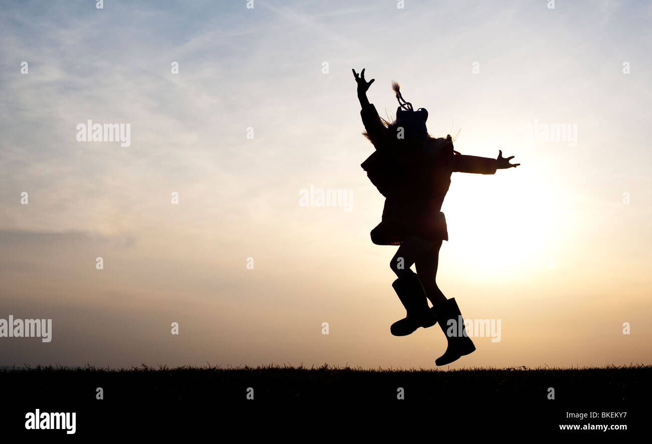 Children jumping for joy silhouette hi-res stock photography and images ...