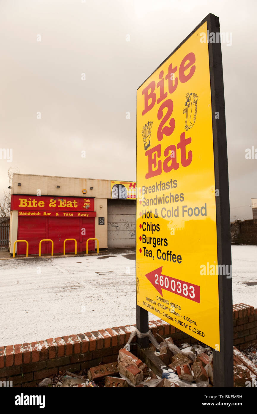 Cafe sign Bite 2 Eat in snow Stock Photo - Alamy