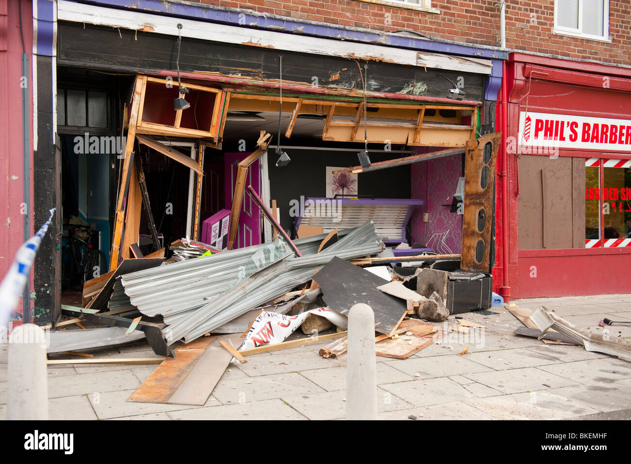 Sunbed shop front smashed after lorry crashed into it Stock Photo - Alamy