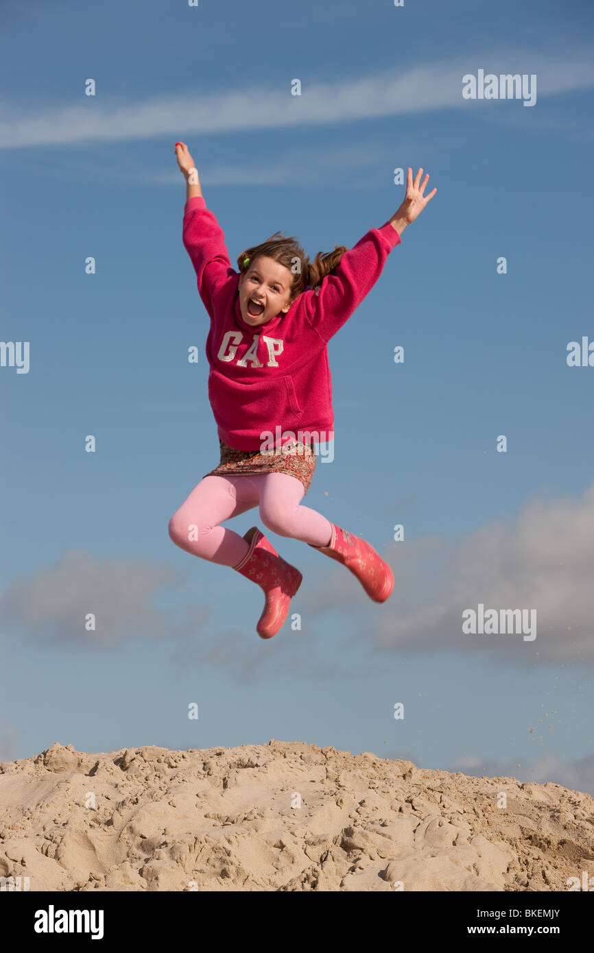 Jumping for joy Stock Photo - Alamy