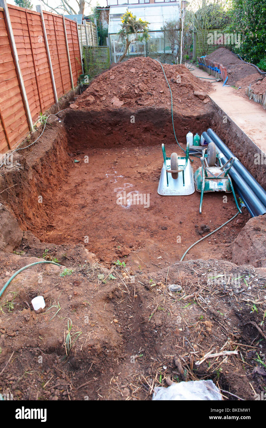 Koi pond construction Stock Photo - Alamy