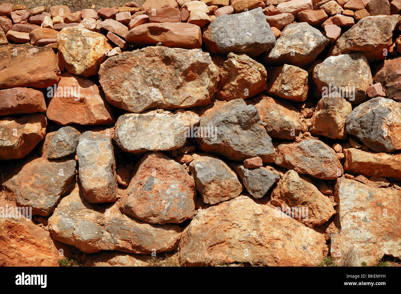 Golden masonry stone wall from old building contruction facade Stock ...