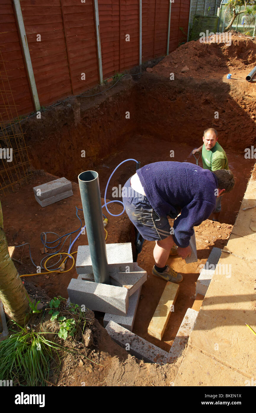 Koi pond construction Stock Photo - Alamy