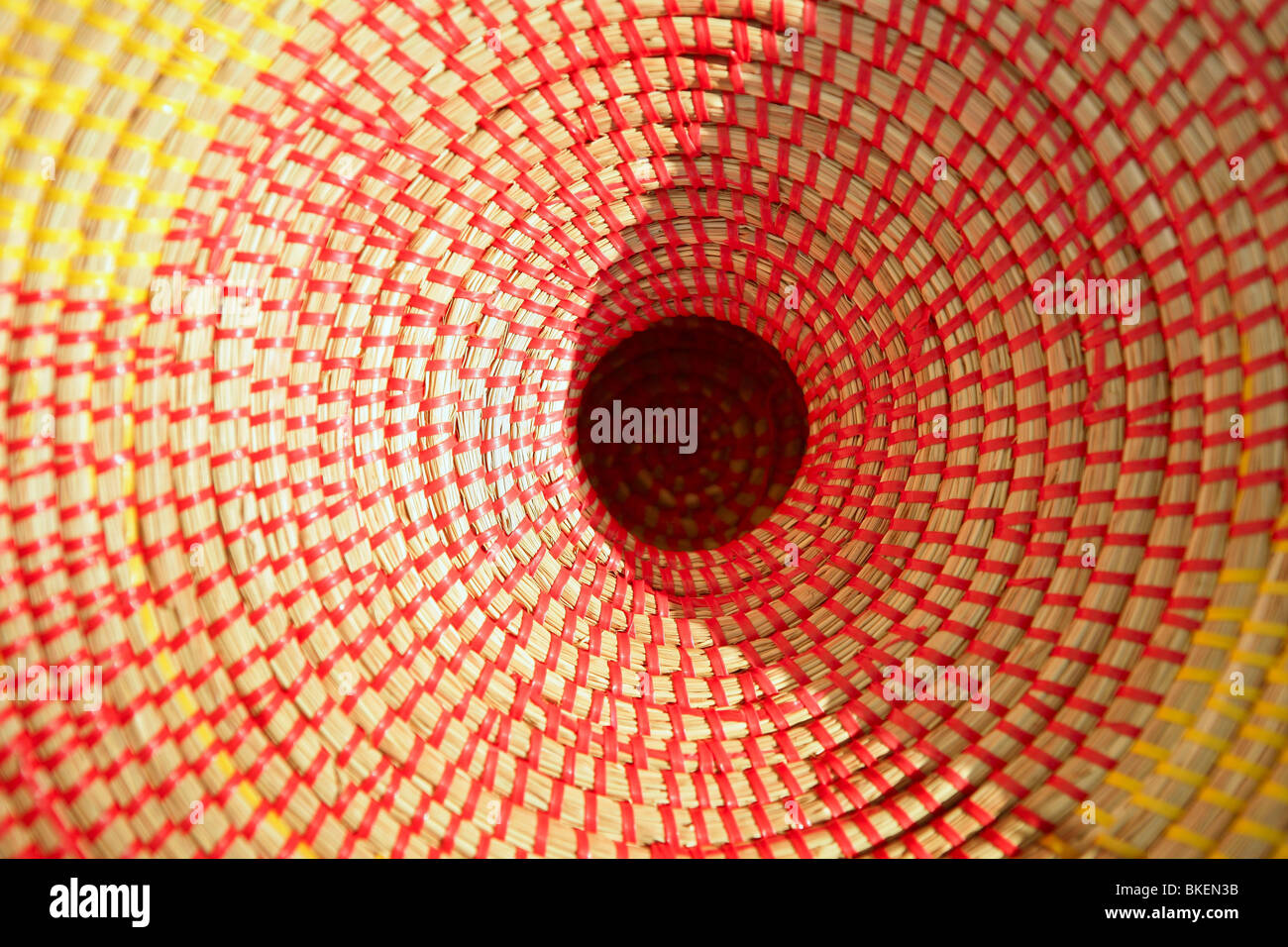 African conical shape colorful hat yellow and red macro texture Stock ...