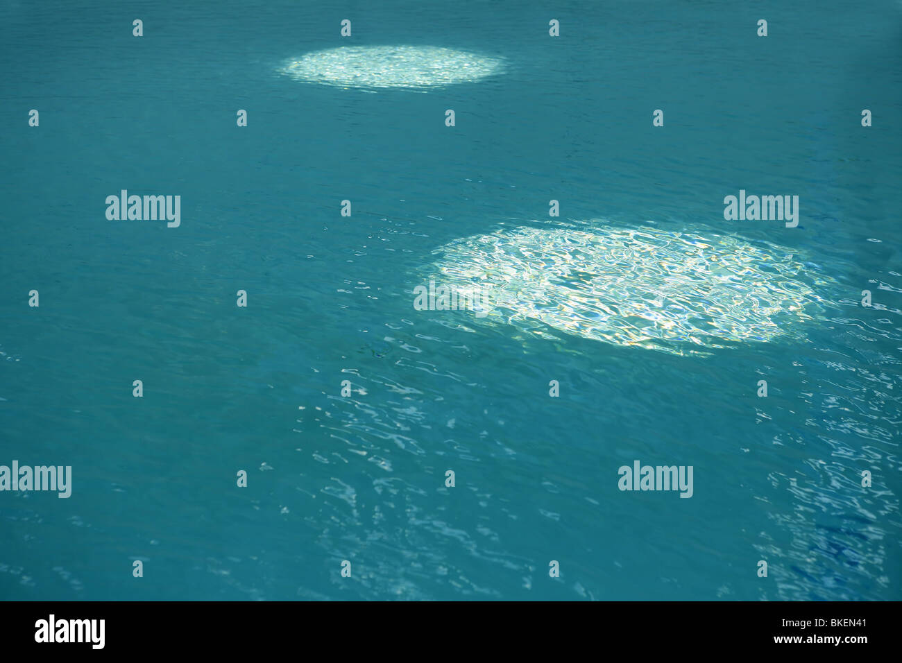 Blue turquoise water texture with circle spot lights illumination Stock ...