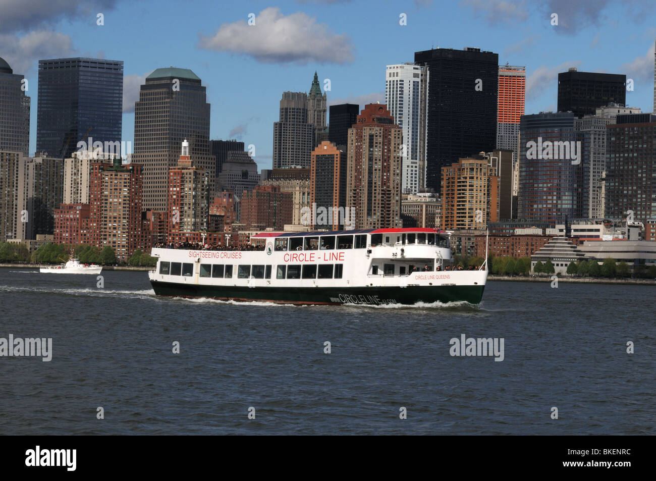 A Circle Line boat takes tourists past Battery Park City in Lower ...