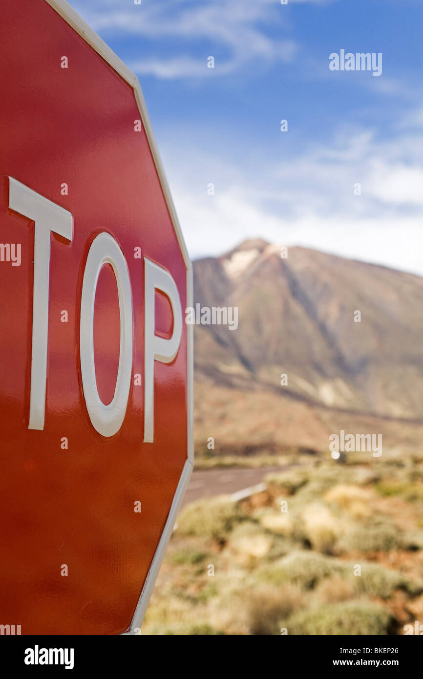 A stop sign stands in front of Mount Teide (3718 m) is Spain's highest ...