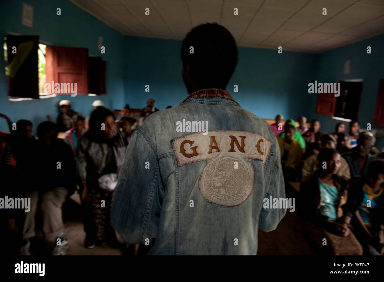 Teacher in 'Gang' denim jacket in classroom in Ethiopia Stock Photo - Alamy