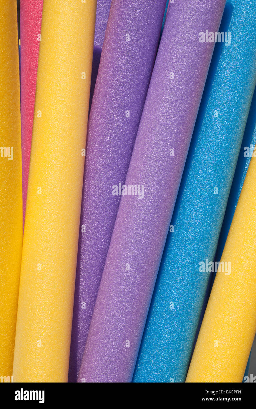 Colourful pool noodles Stock Photo - Alamy