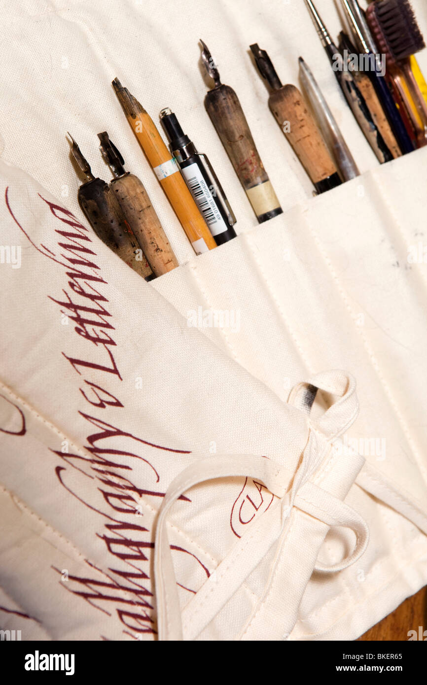 crafts calligraphy pens, in unrolled cloth wrap Stock Photo - Alamy