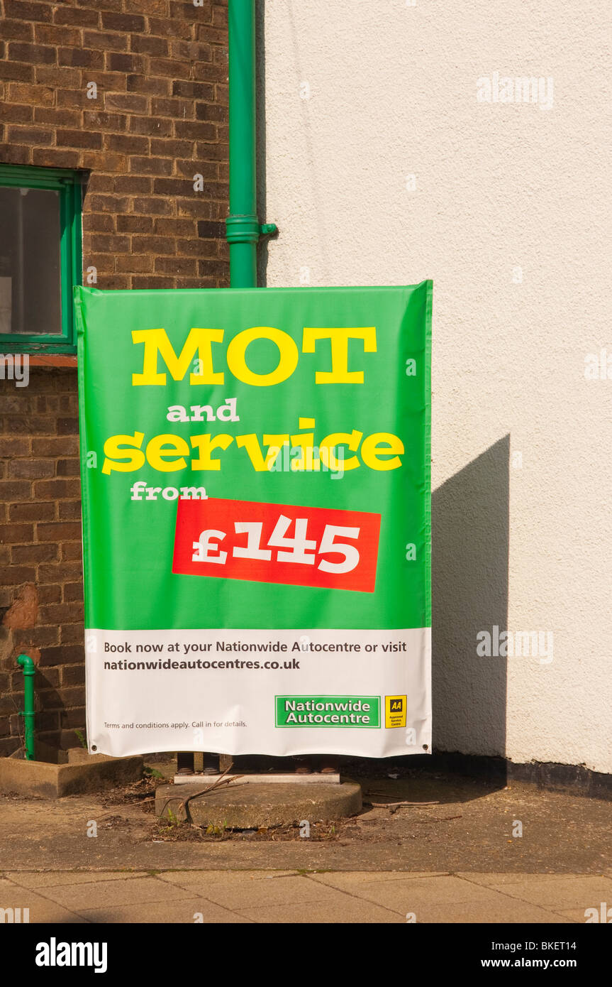 A garage sign advertising MOT and service on cars in Bury Saint Edmunds ...