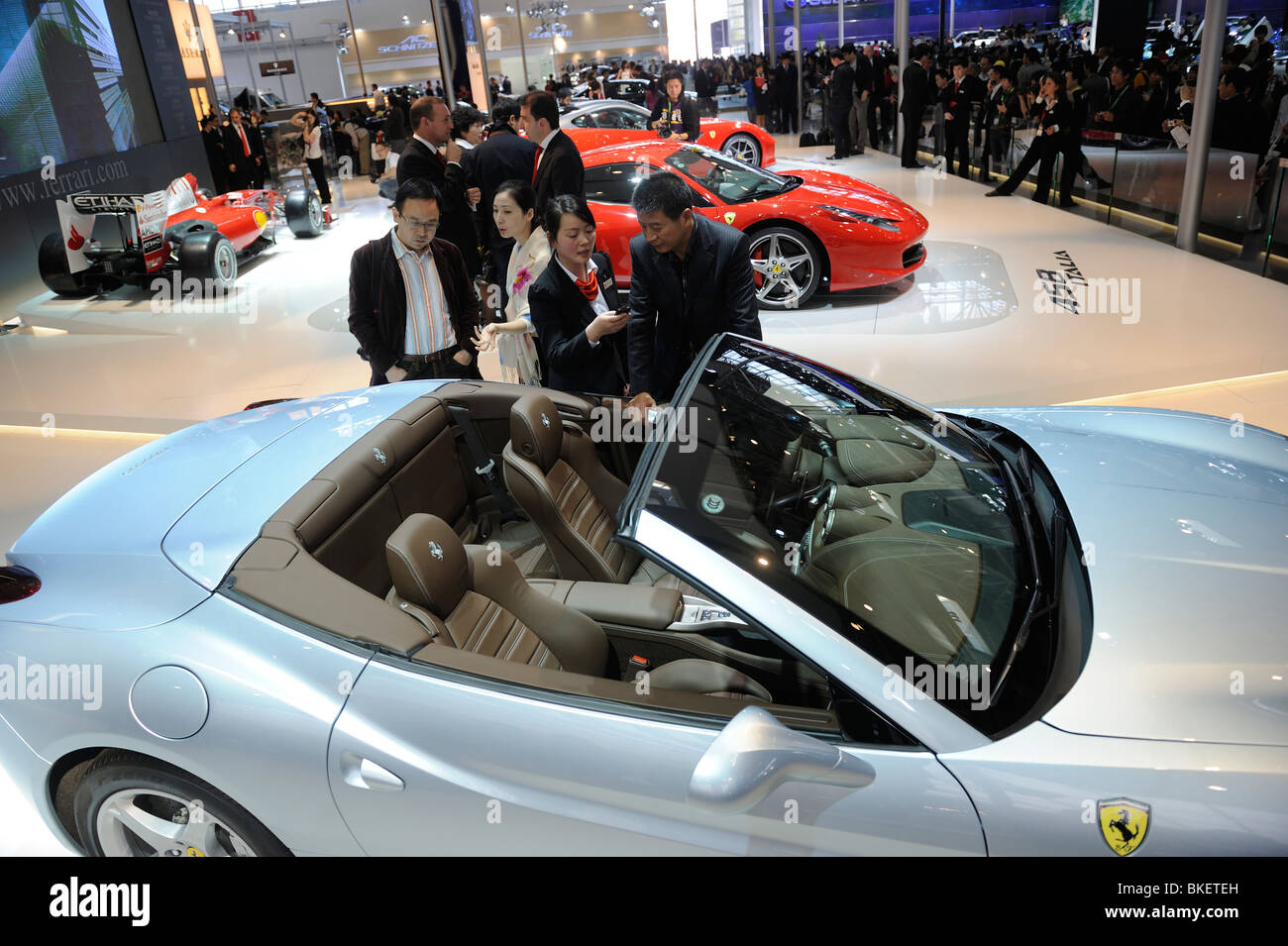 Potential buyers at Ferrari stand during the Beijing Auto Show. 23-Apr ...