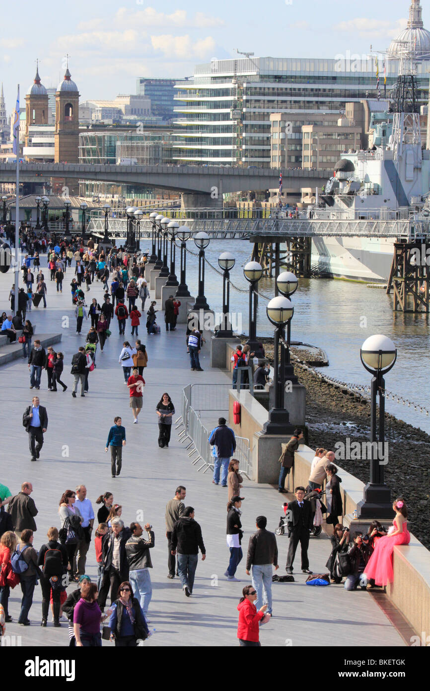 riverside near tower bridge london busy tourists england uk gb Stock ...