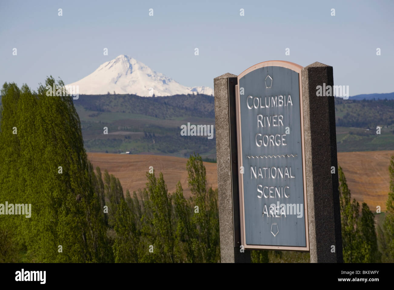 Mount Hood and a sign for the Columbia River Gorge National Scenic Area ...