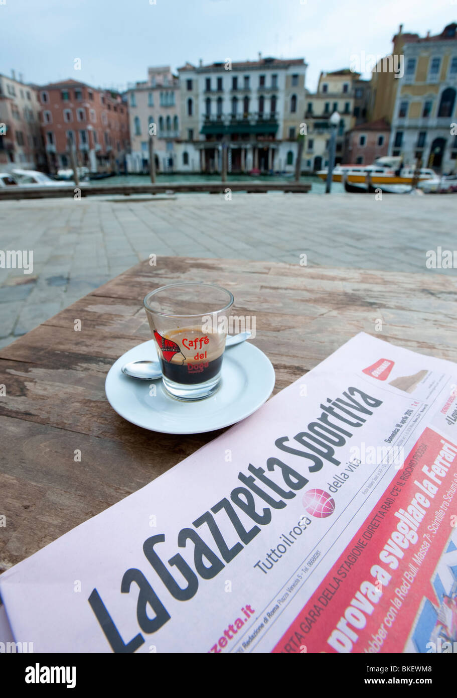 Detail of Italian newspaper and coffee at typical cafe in Venice Italy ...