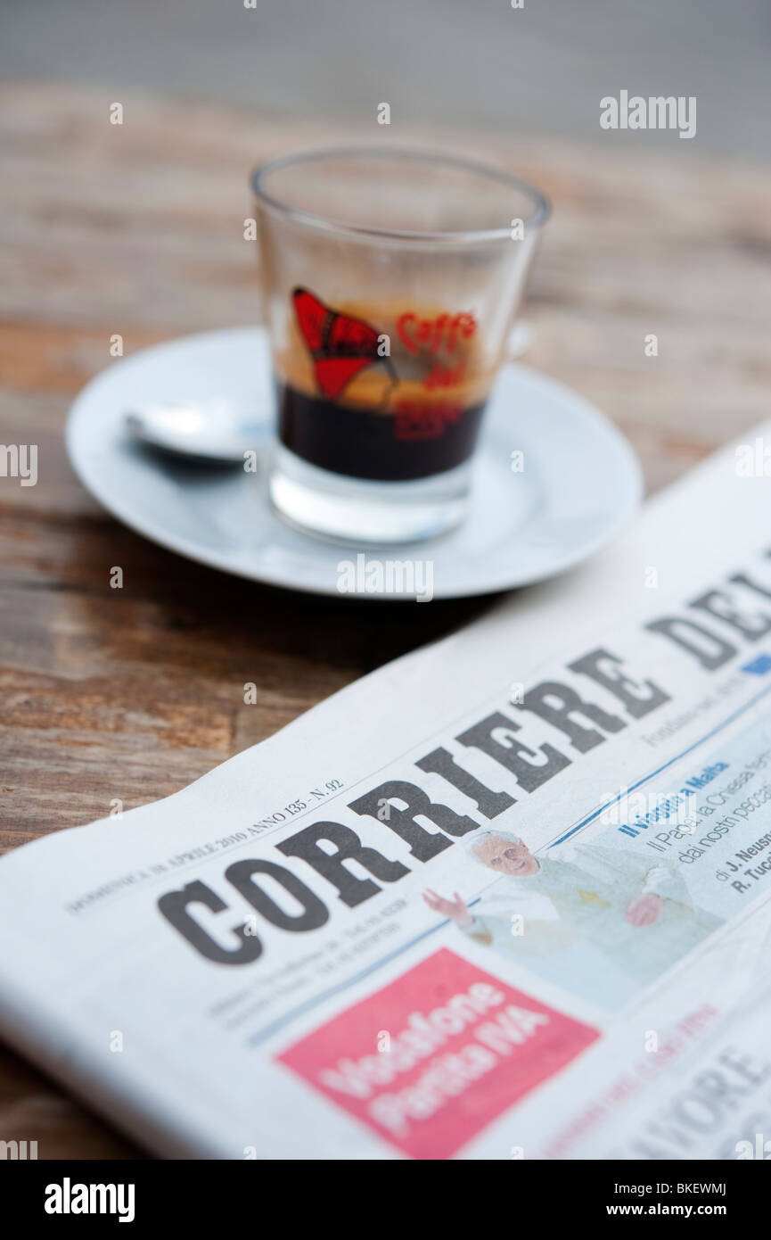 Detail of Italian newspaper and coffee at typical cafe in Venice Italy ...