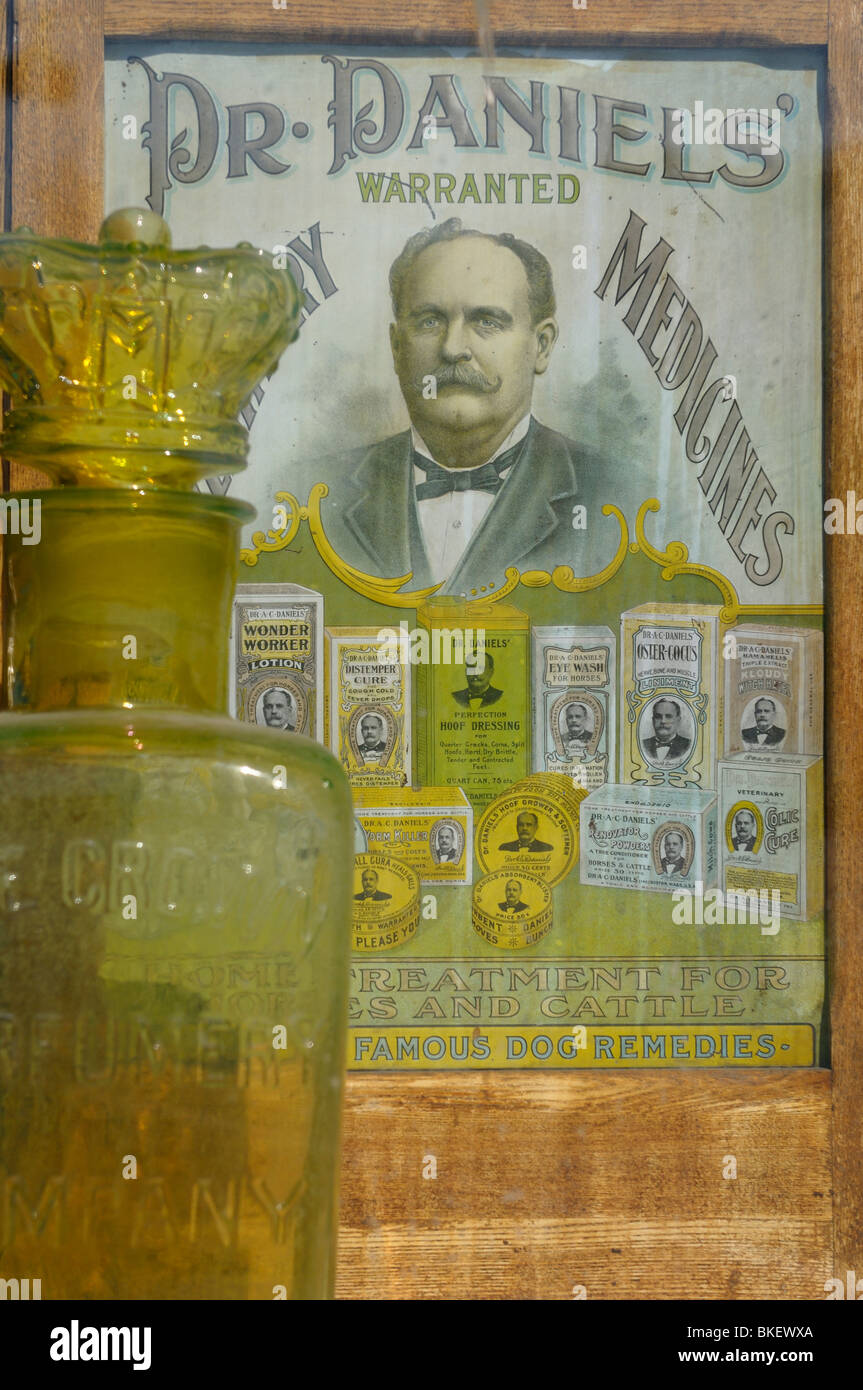 Apothecary with antique jar and veterinary medicine advertisement Stock ...