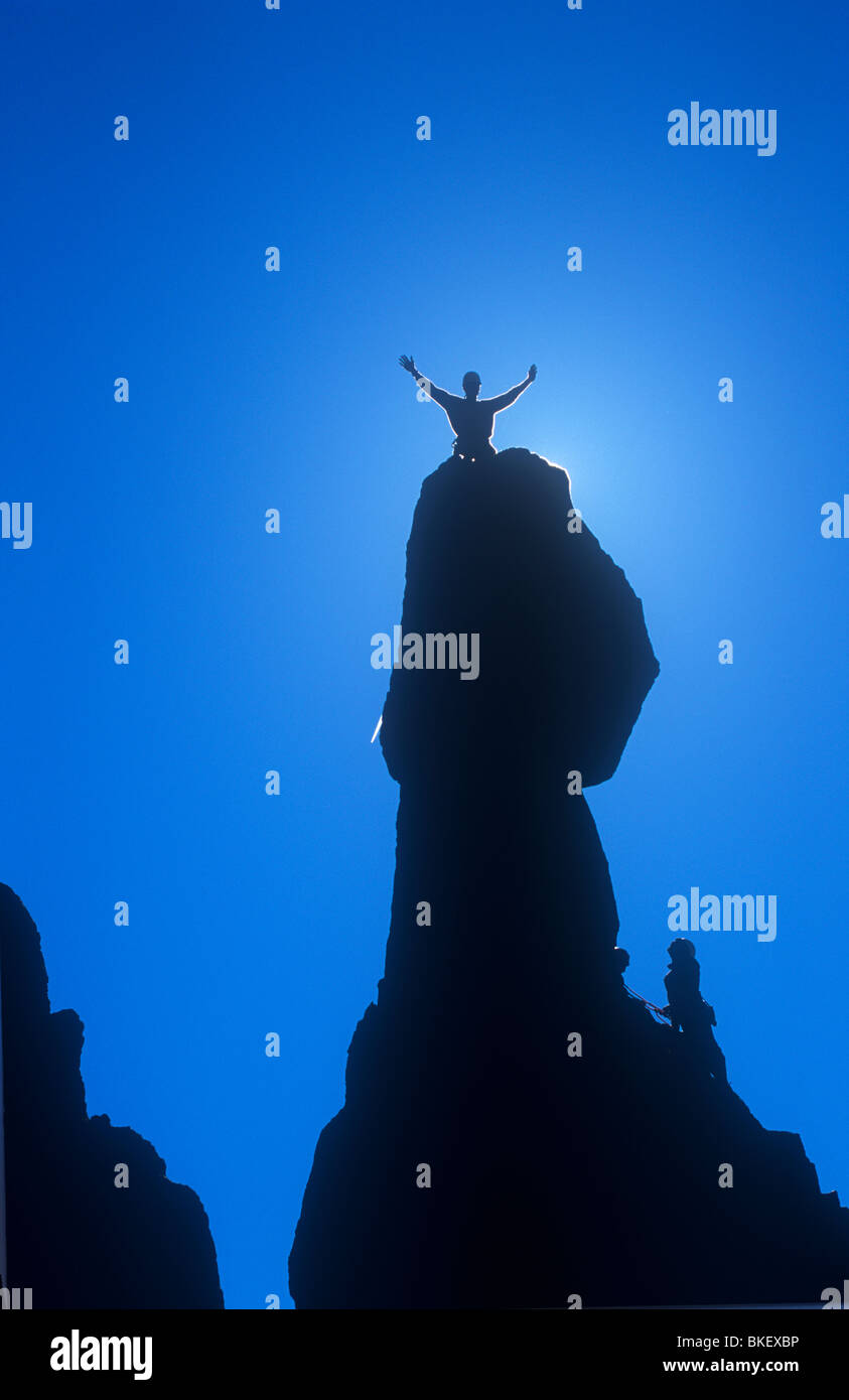 Climbers on Napes Needle, a pinnacle of rock on Great Gable in the Lake ...
