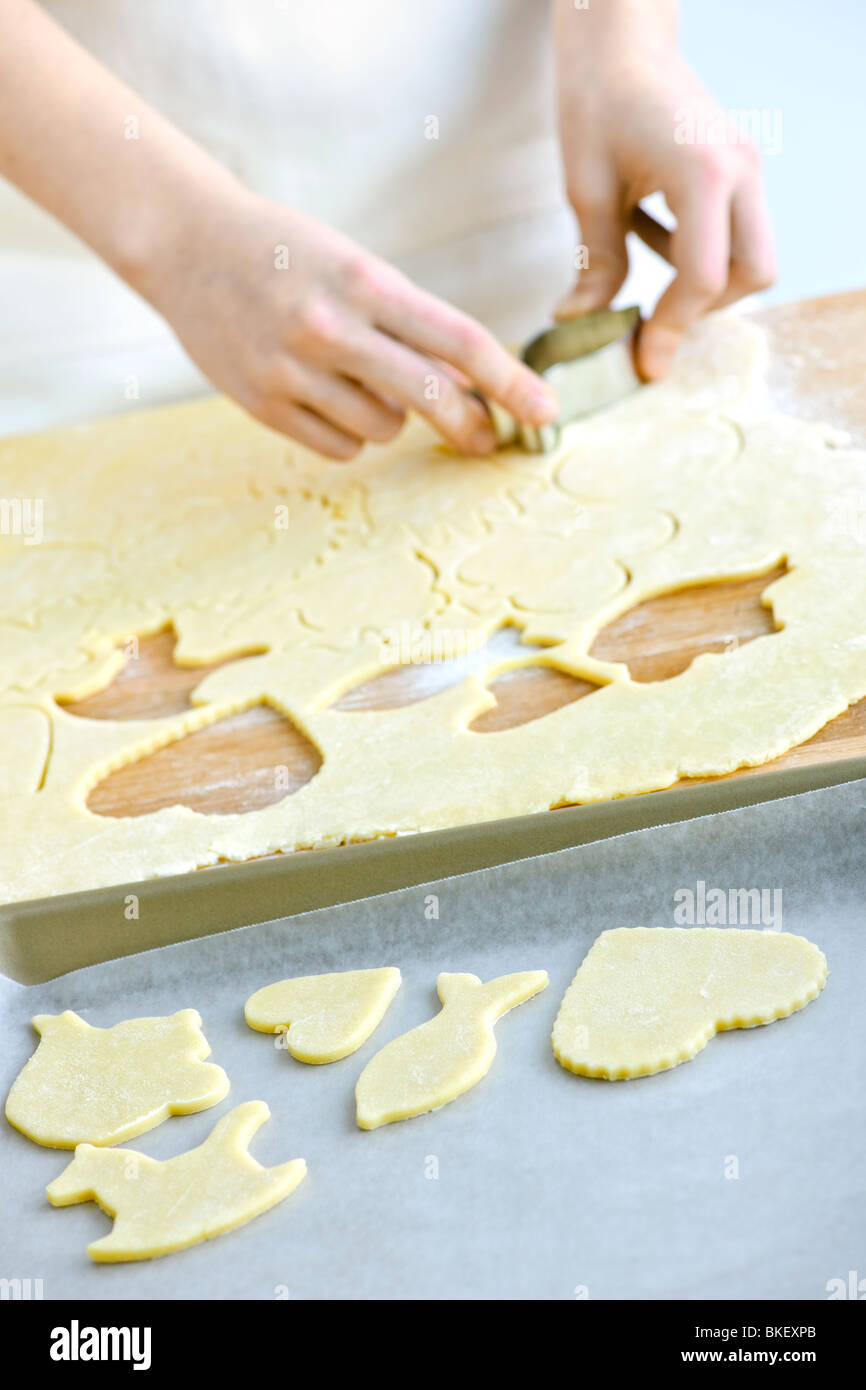 Woman using cookie cutters hi-res stock photography and images - Alamy