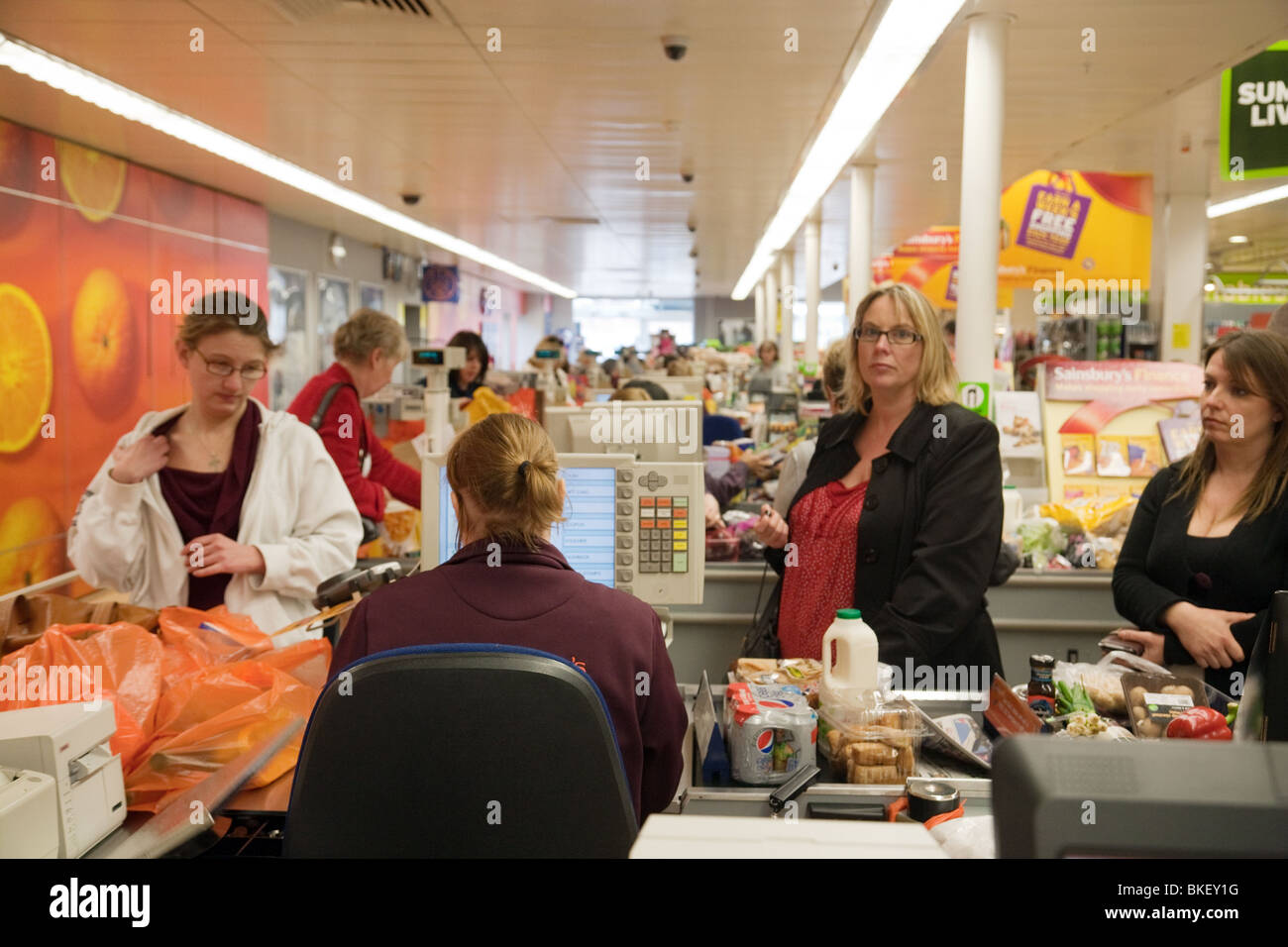 People at the checkout in Sainsburys supermarket London, UK Stock Photo ...