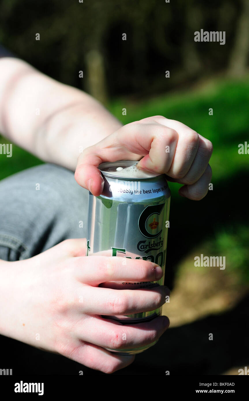Opening Tin of Lager Stock Photo - Alamy