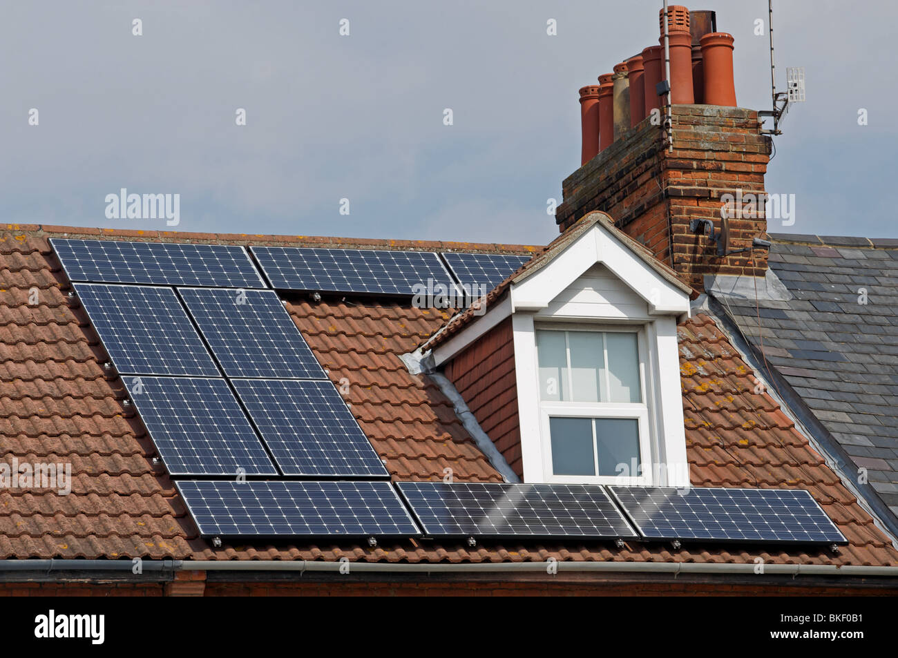 Solar panels fitted to the roof of a UK residential property Stock ...