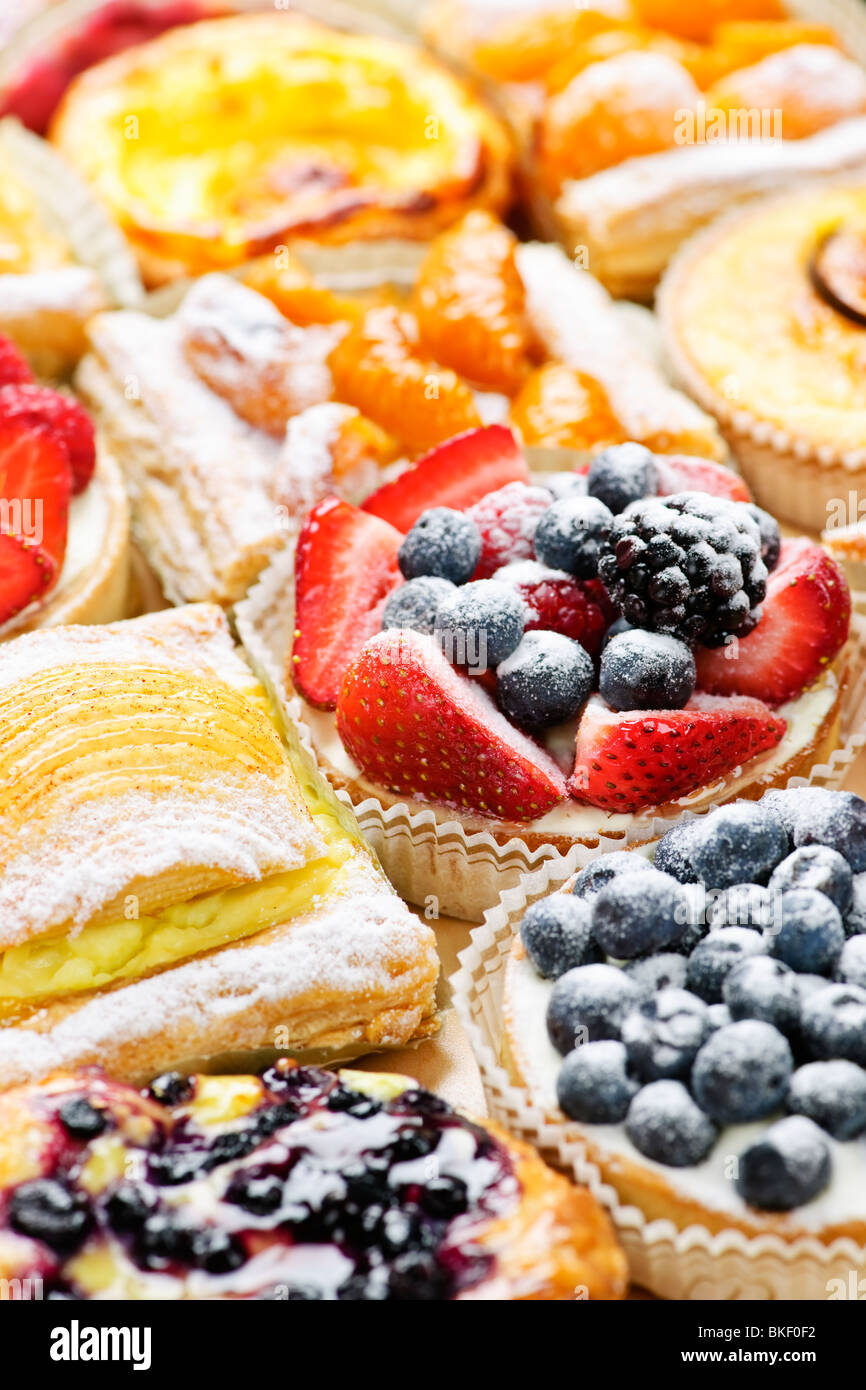 Background of assorted fresh sweet tarts and pastries Stock Photo - Alamy