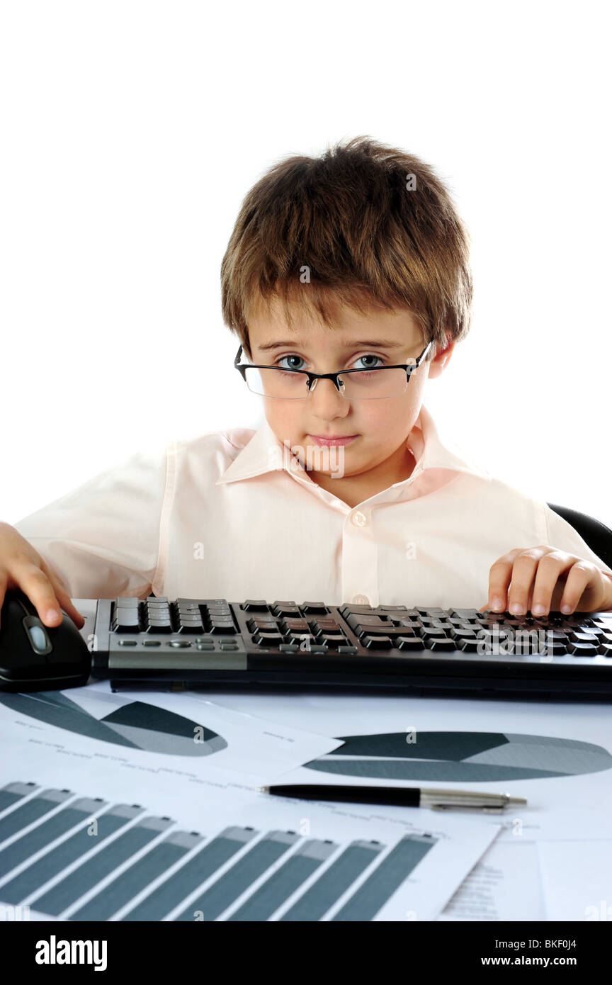 Vertical image of a young boy looking sad and fed up in his office ...
