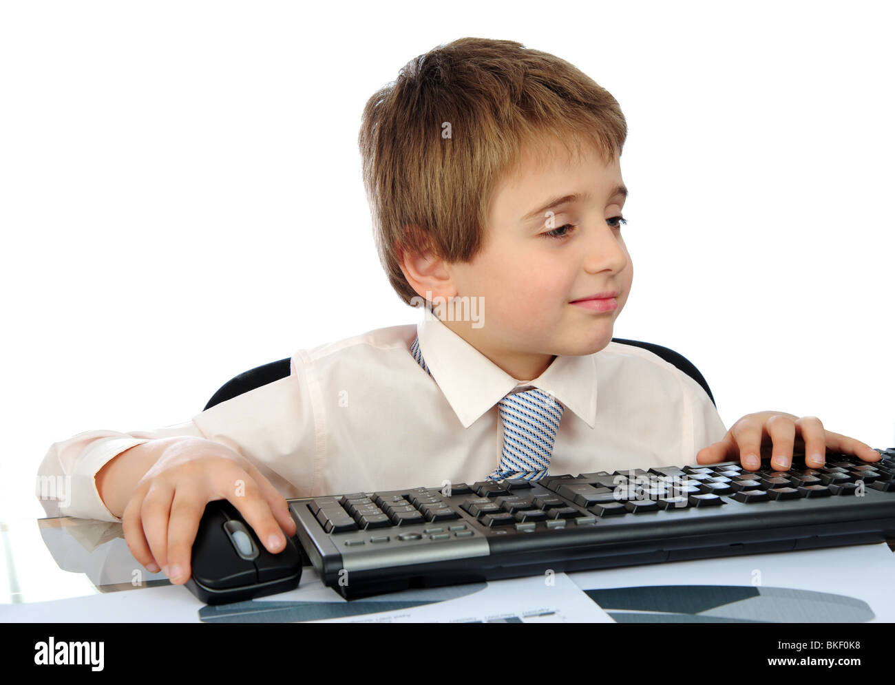 Horizontal image of a young boy working on his computer Stock Photo - Alamy