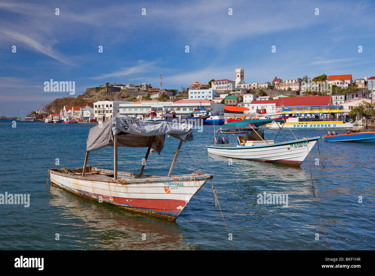 Colorful fishing boats in the harbor in St. George's, Grenada, West ...
