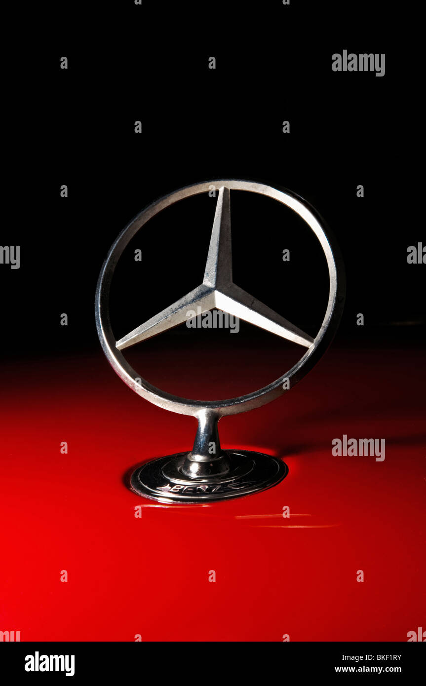 Mercedes Benz Hood Ornament, Emblem, star, on red Mercedes automobile ...