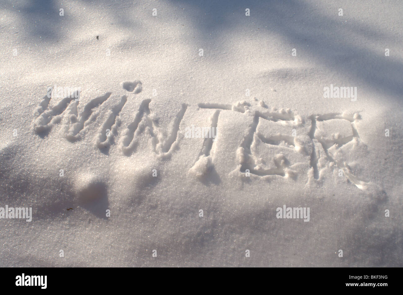 written in the snow Stock Photo - Alamy