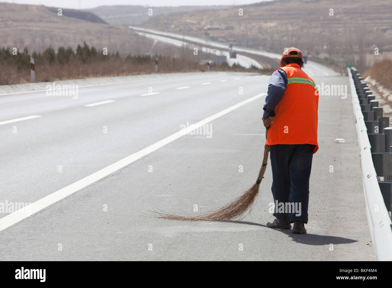 Do jobs come any more boring. A chinese road sweeper whose job it is to ...