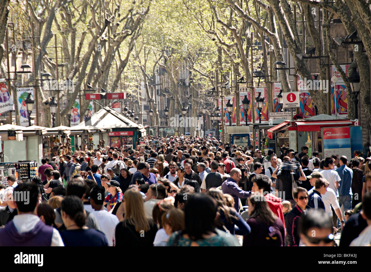 Tourists Walk Famous La Rambla Street In Barcelona High Resolution ...