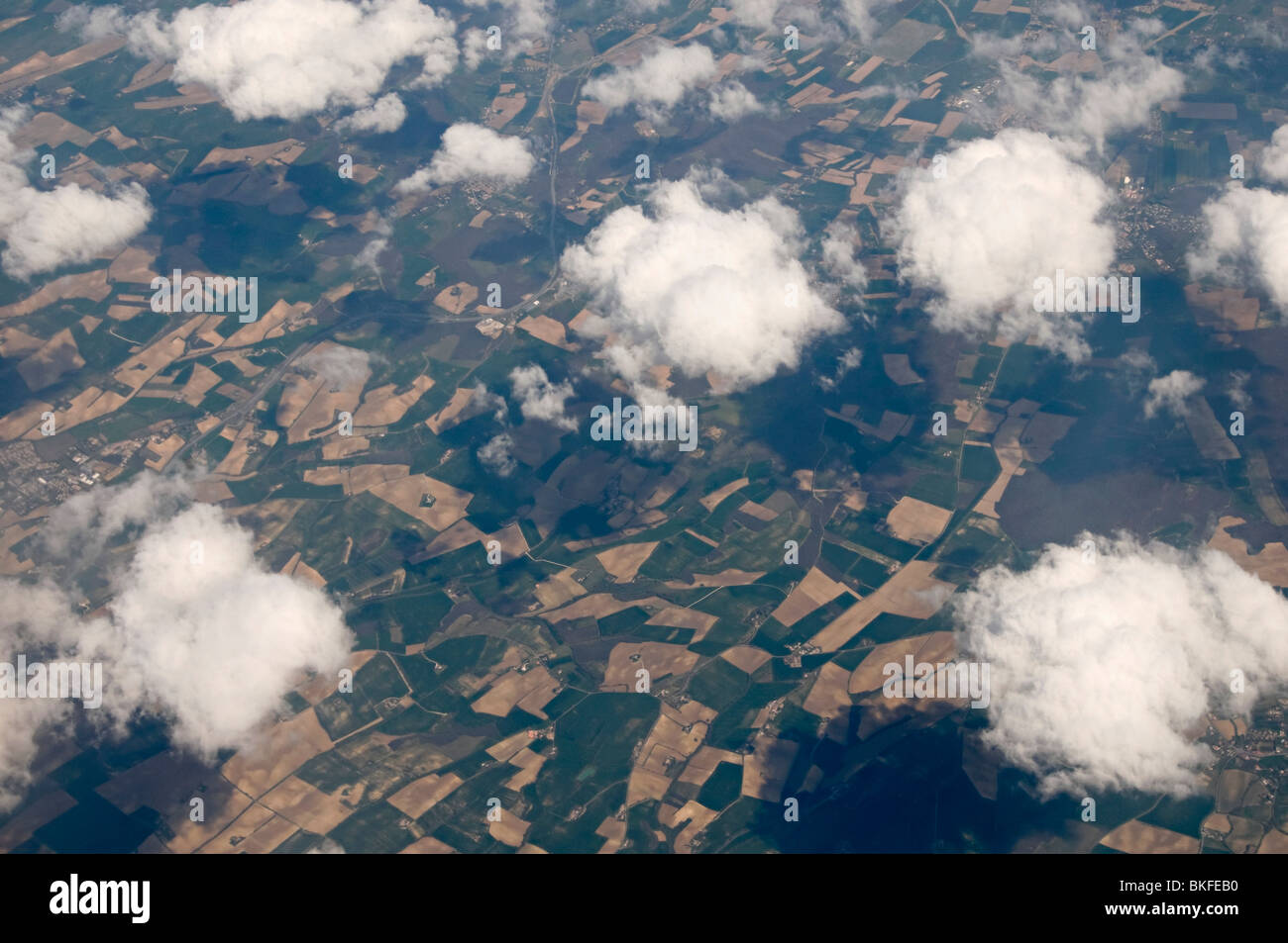 the sky and earth from above taken from an airplane window Stock Photo ...