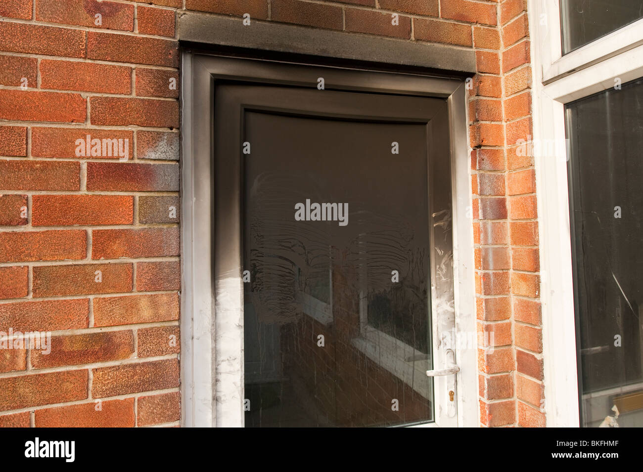 Smoke damage to front door following house fire Stock Photo - Alamy