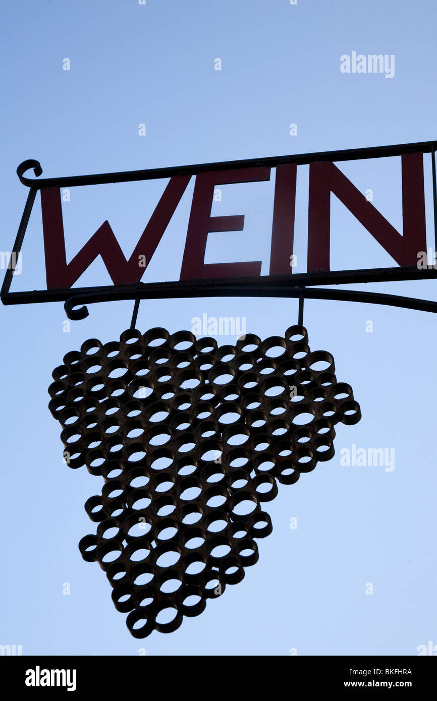 A sign advertises a wine merchants in the German language Stock Photo ...