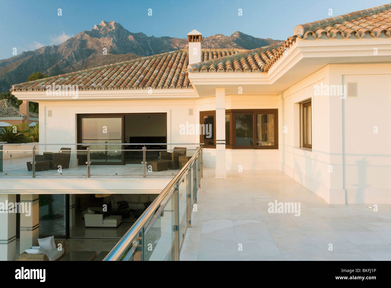 Large marble-floored balcony of newly-built traditional villa in the ...