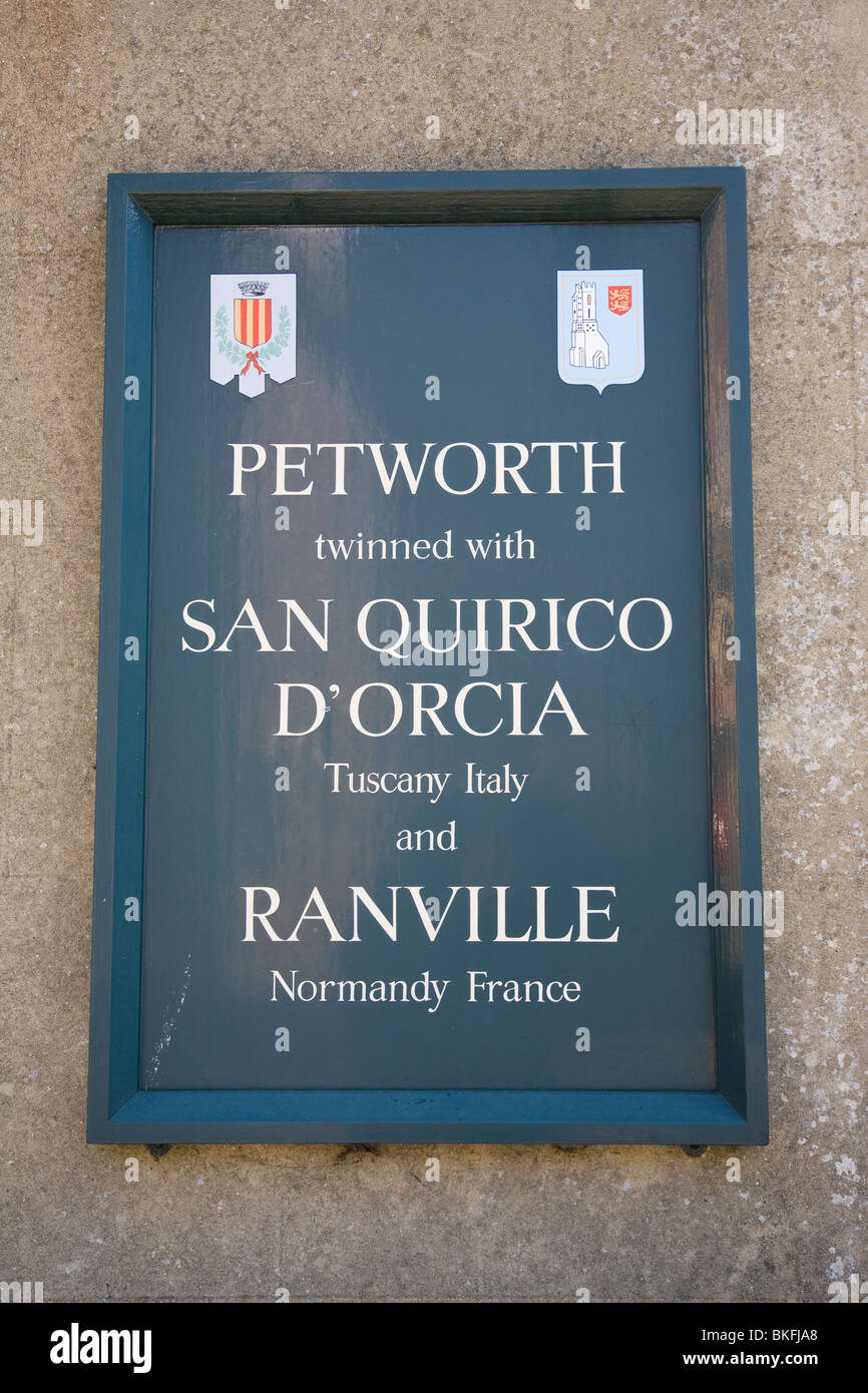 A sign displaying the 'twinning' towns of Petworth, outside the ...