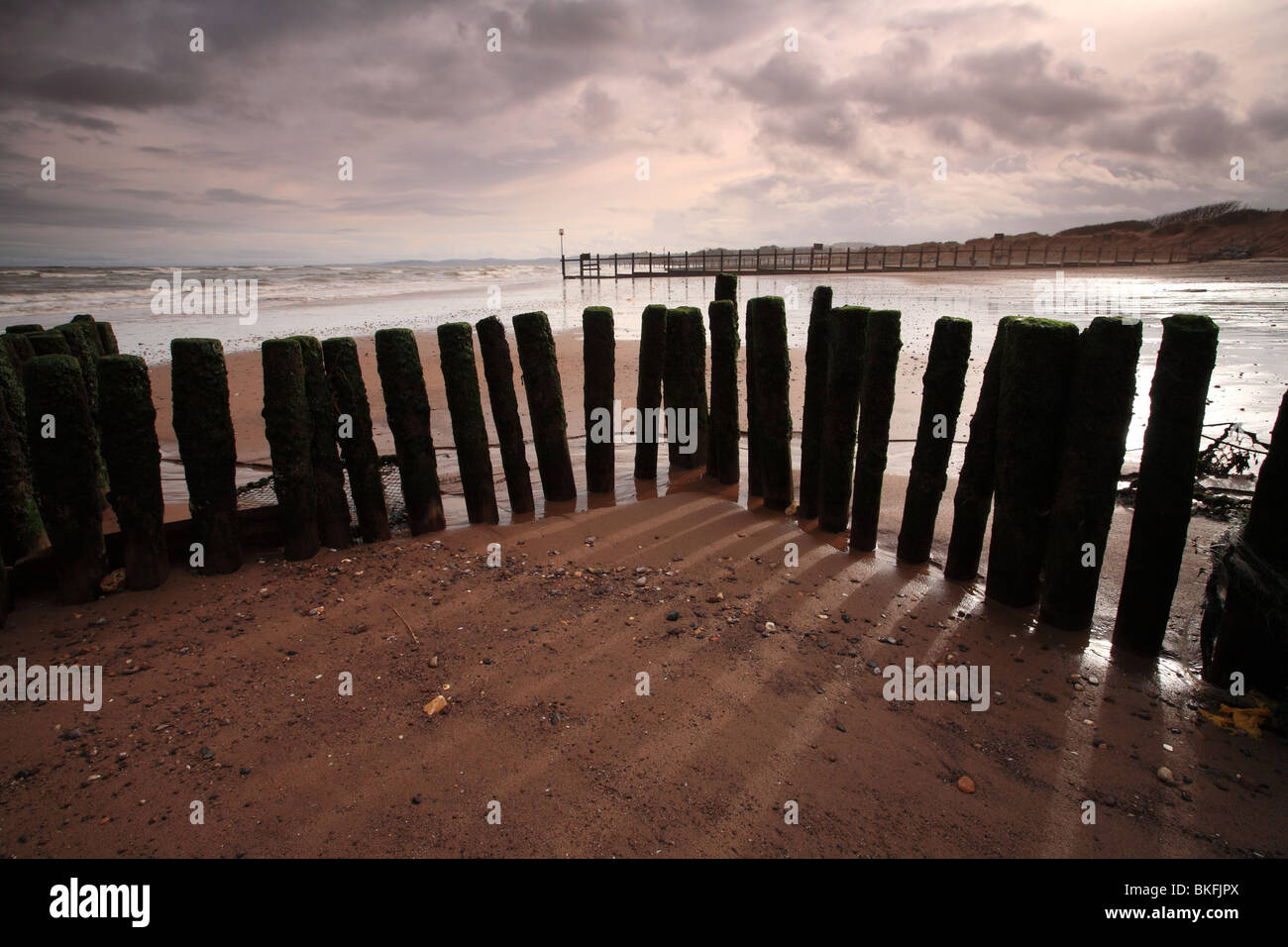 Sea defenses on Dawlish Warren beach, Devon, England, UK Stock Photo ...