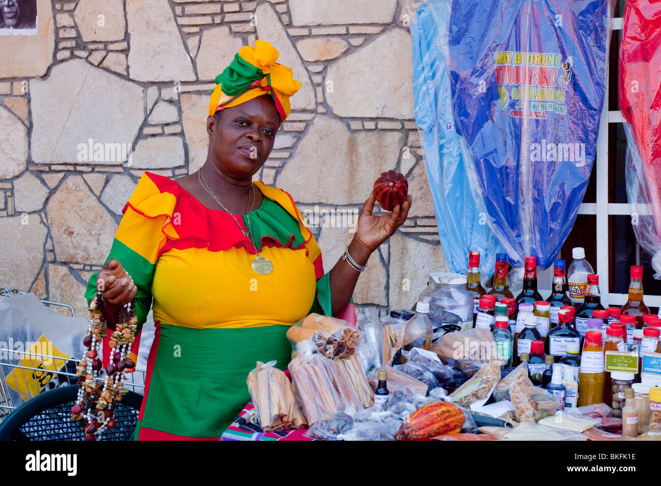 A lady in ethnic dress at a street market kiosk in St. George's ...