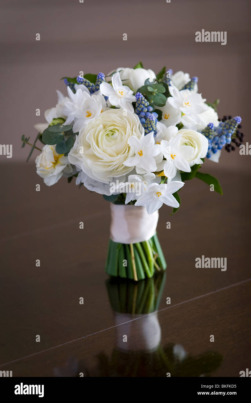 bouquet or posey of spring flowers including ranunculus, daffodil ...