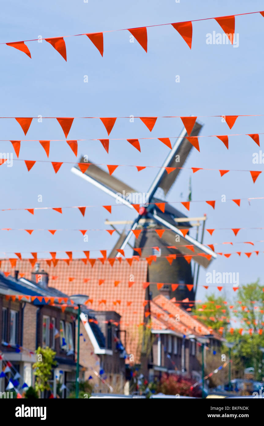 A street in the Dutch town of Veenendaal decorated with flags in ...