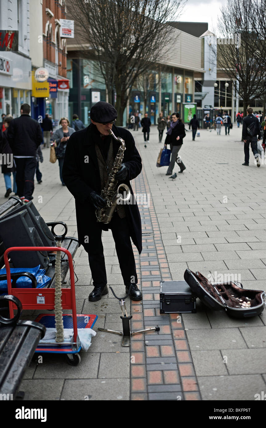 Busker saxophone hi-res stock photography and images - Alamy