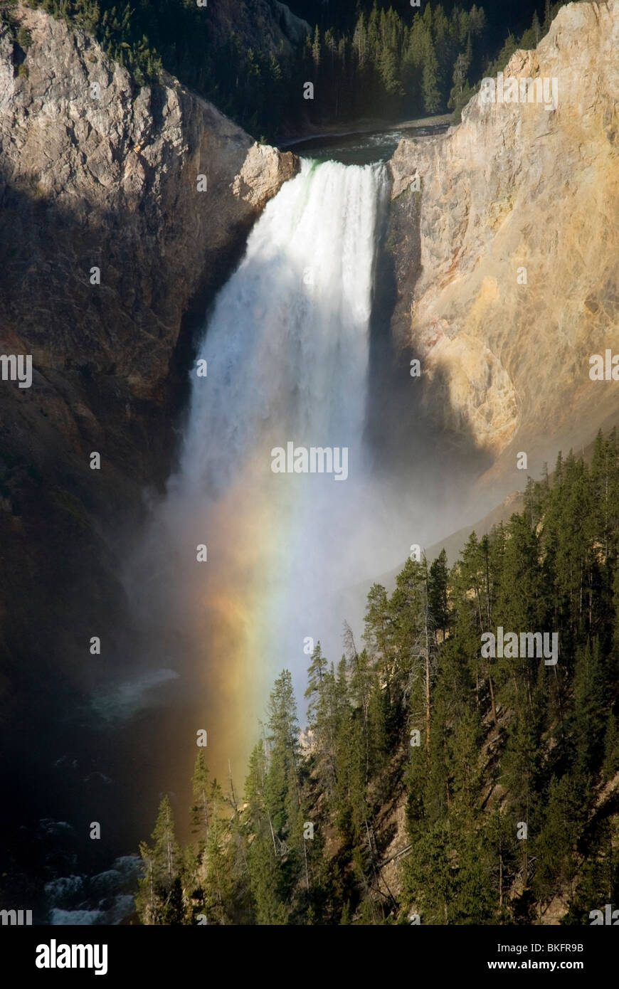 Waterfall Over Cliff Creating A Rainbow Stock Photo - Alamy