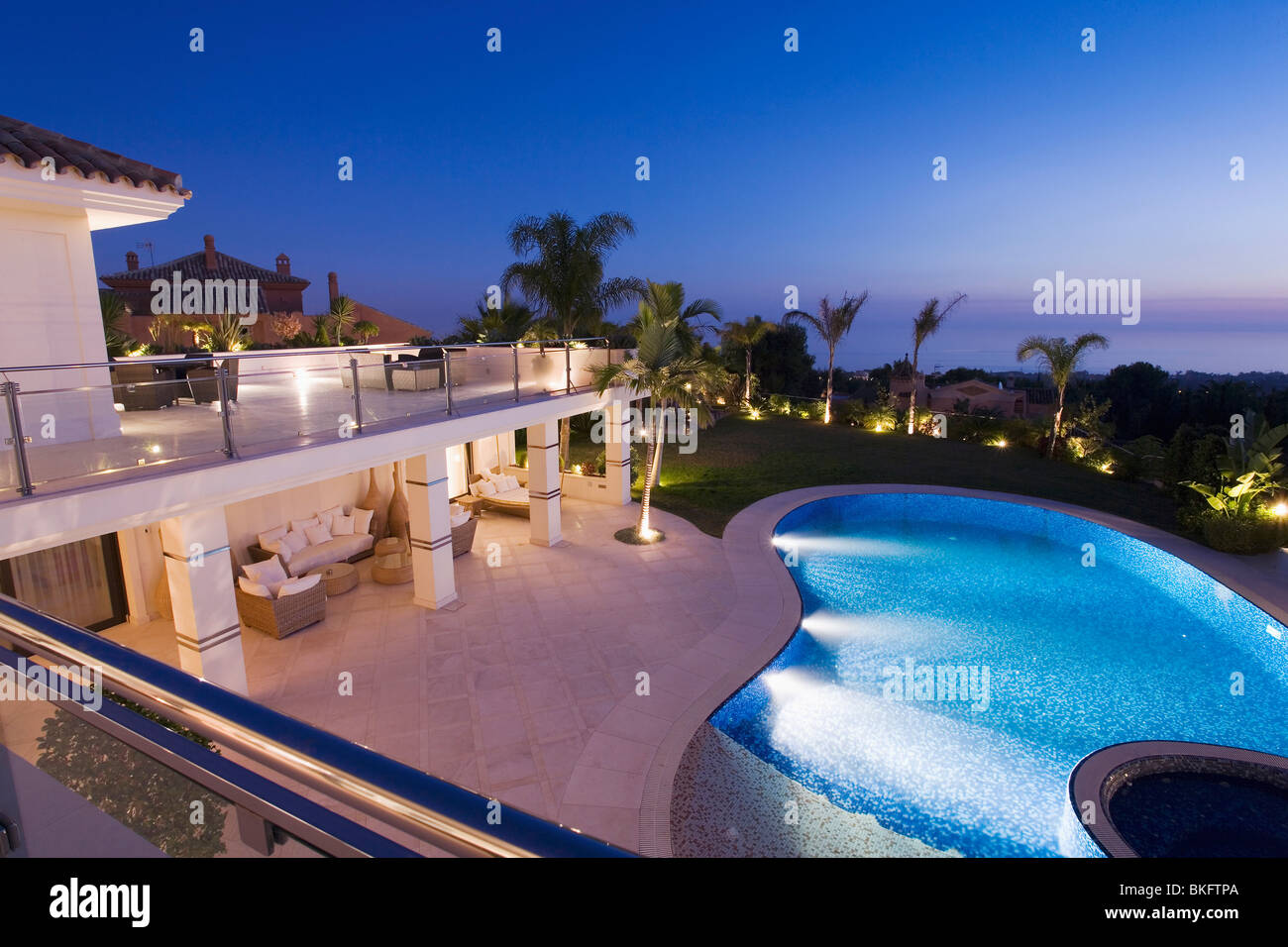 Large Spanish villa at night with balcony and terrace overlooking ...
