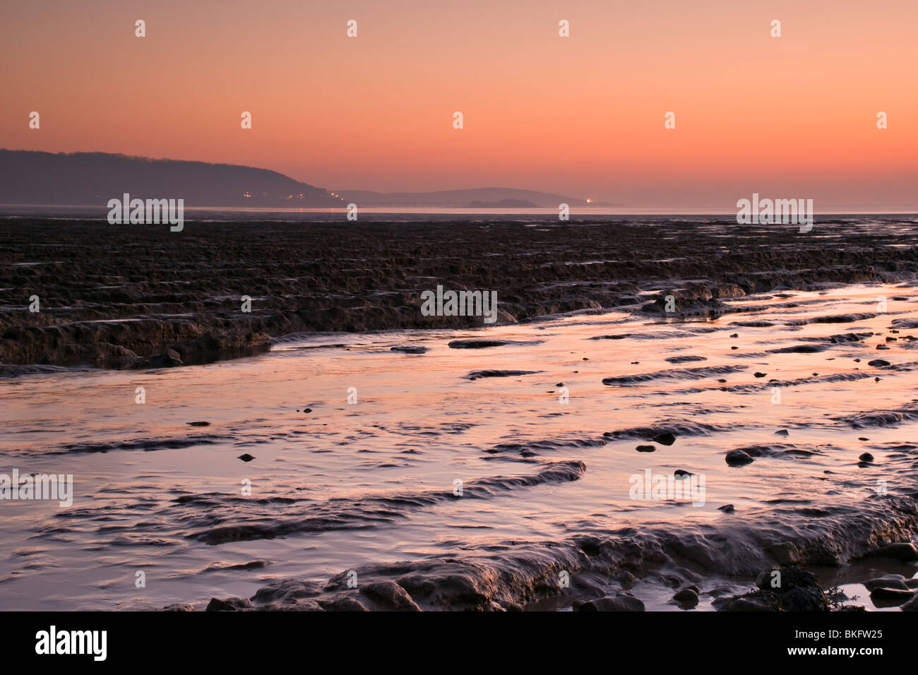 Sunset over the mudflats at Sandpoint, near Weston Super Mare, England ...