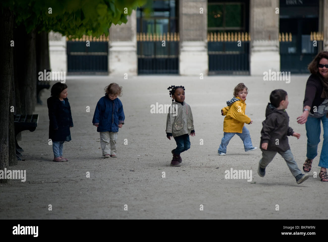 Group of Young French Children Enjoying Urban Park, "Jardin du Palais ...