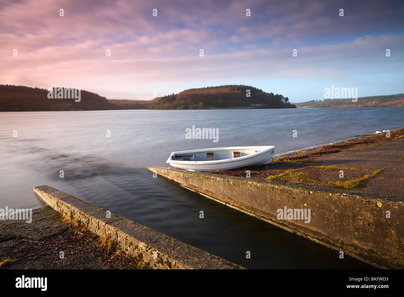 Usk reservoir outflow and boat, Brecon Beacons National Park, Wales, UK ...