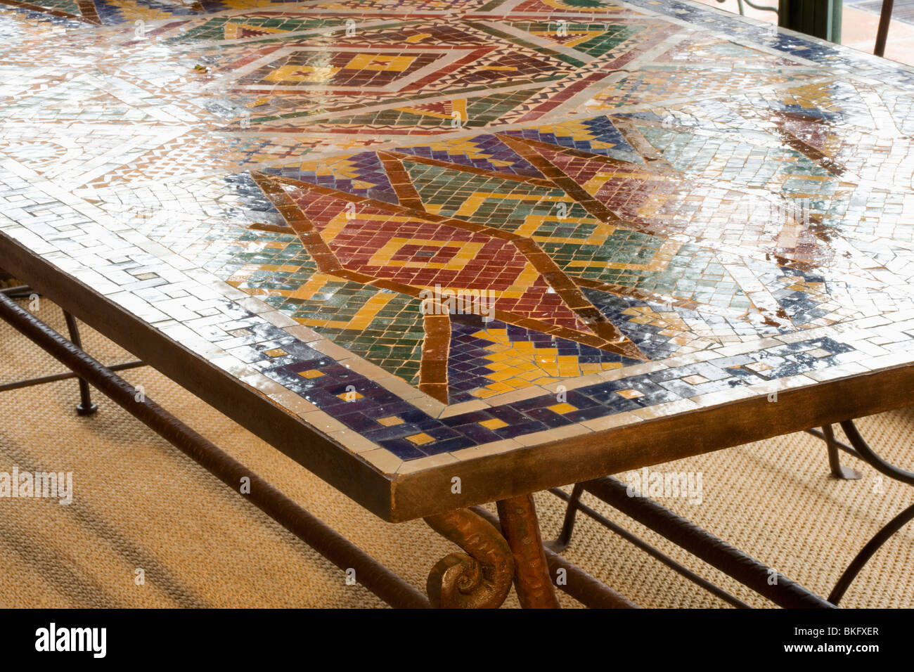 Close-up of mosaic tiled Spanish table Stock Photo - Alamy